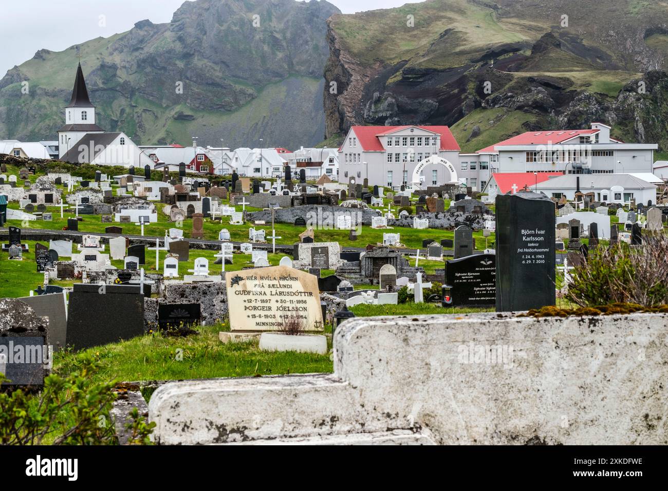 The city of Heimaey and the haven are located at the foot of the ...