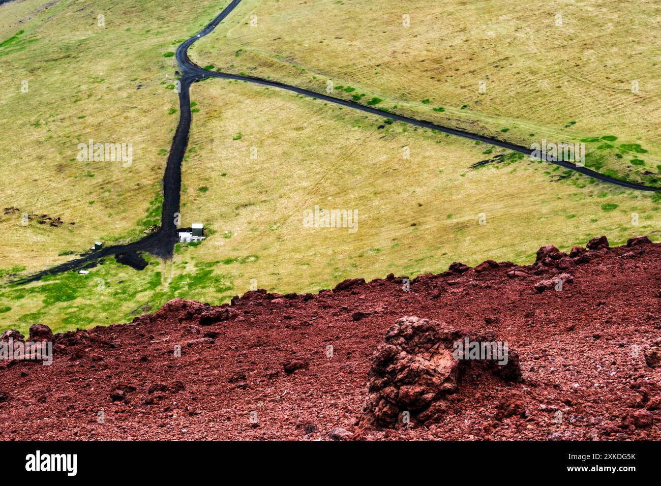 The city of Heimaey and the haven are located at the foot of the ...