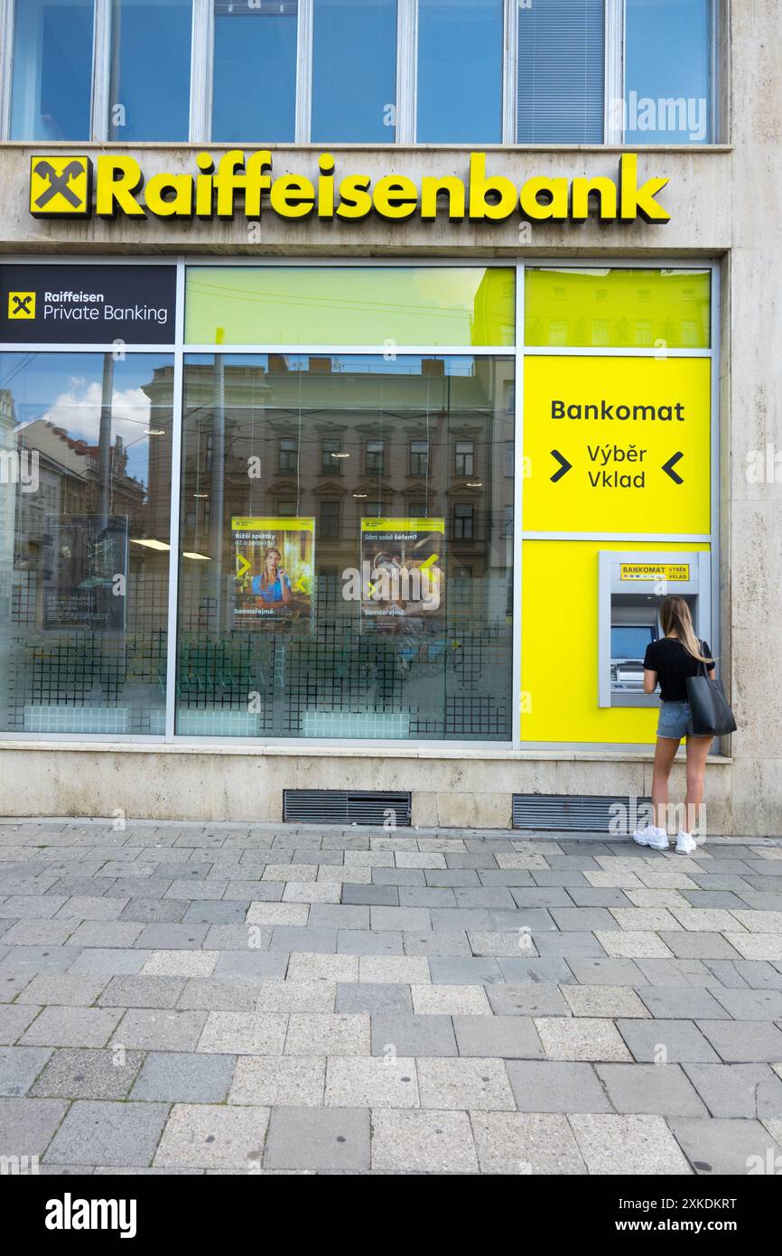 Woman raiffeisen bank atm hi-res stock photography and images - Alamy