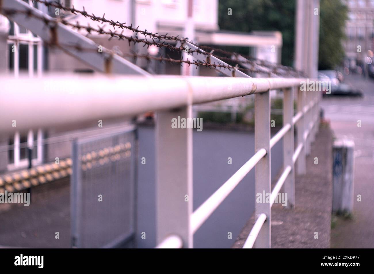 Barbed wire on the fence Stock Photo - Alamy