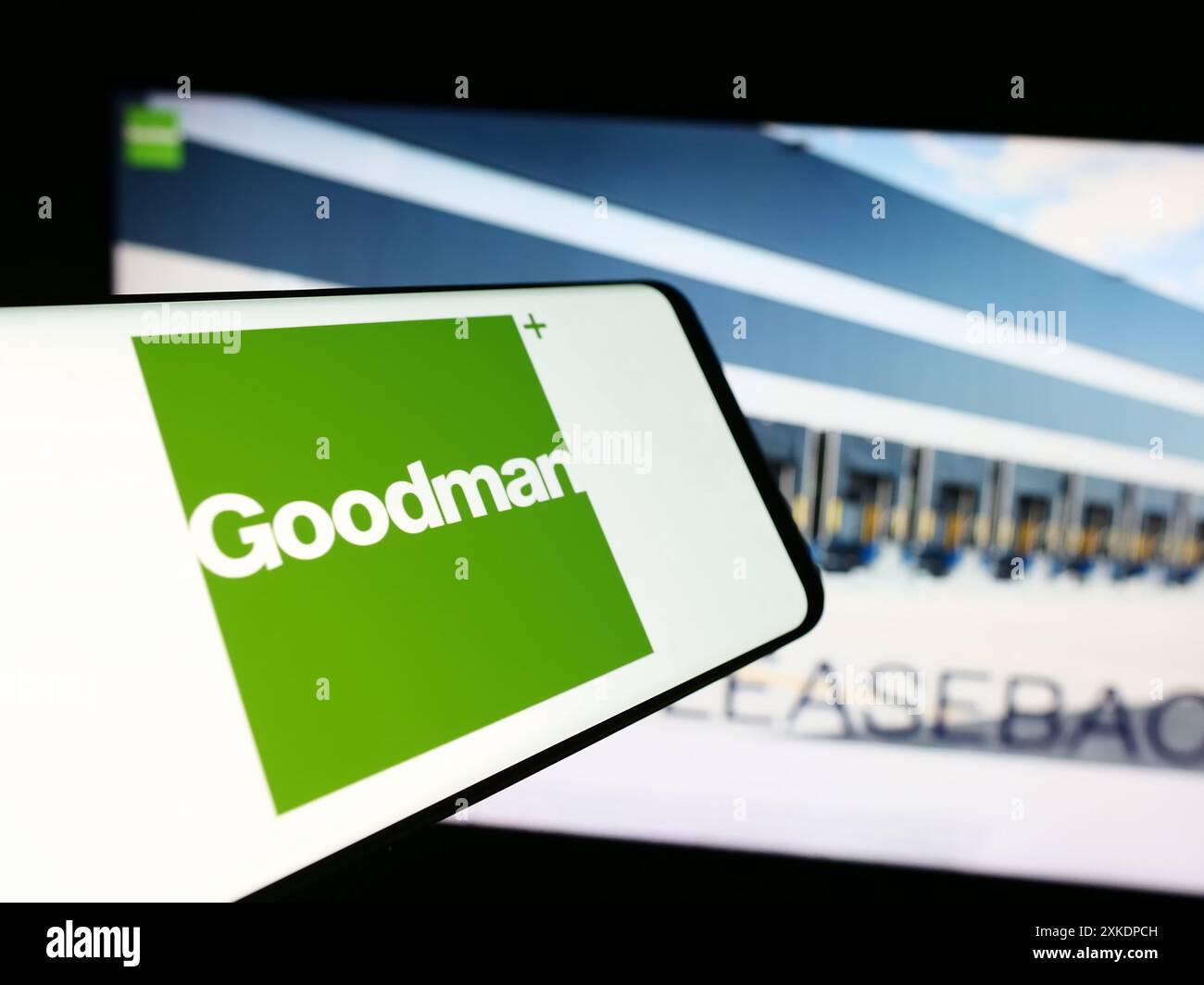 Cellphone with logo of Australian property company Goodman Group in ...