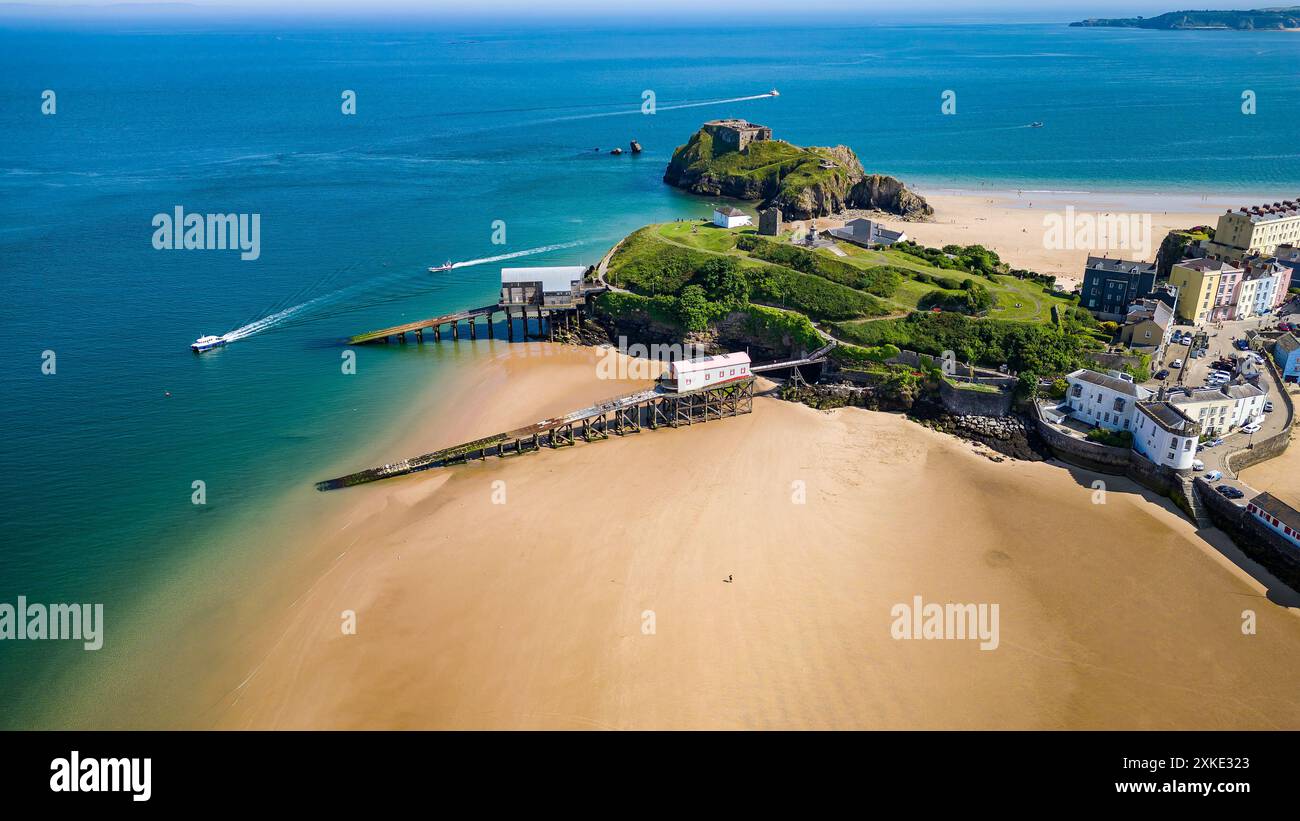Aerial view of the dry harbor and large sandy beach at low tide in ...