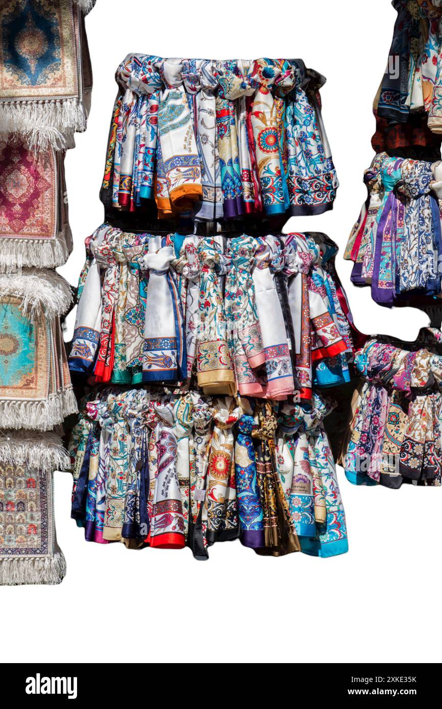 Sale of textiles and fabric on white background on the Turkish market ...