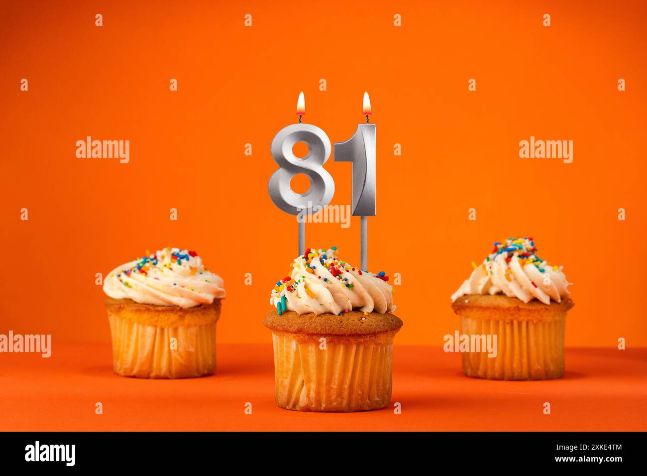 Candle number 81 - Celebration with birthday cupcake on orange ...