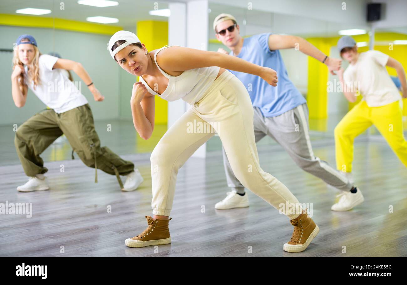 Young girl in cap dancing hip hop Stock Photo - Alamy