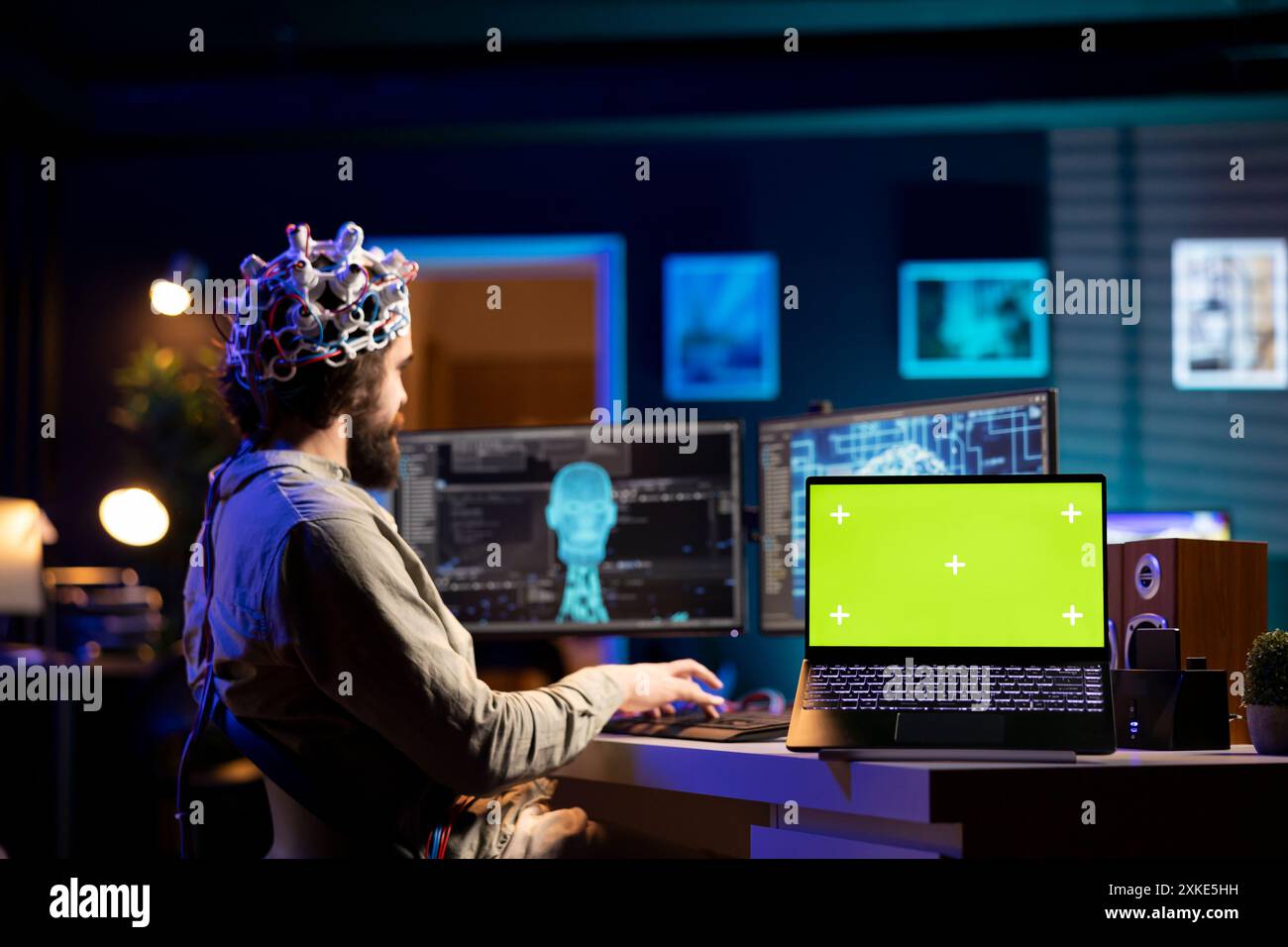 Software engineer with EEG headset starting mind upload trying to gain bionic powers, isolated ...