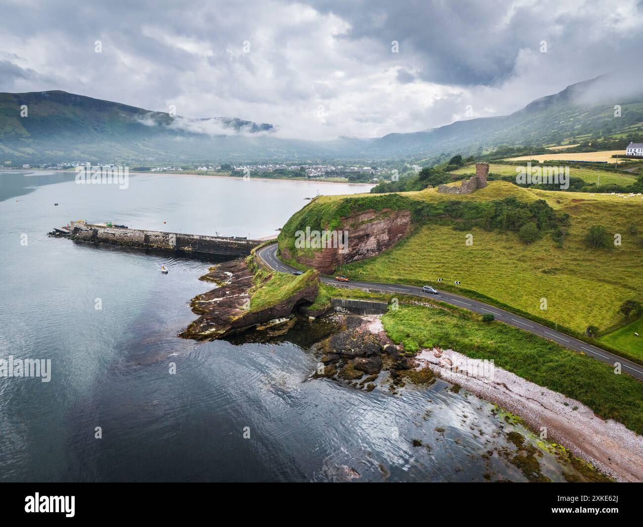 Red Bay Castle on the Antrim Coast Stock Photo - Alamy
