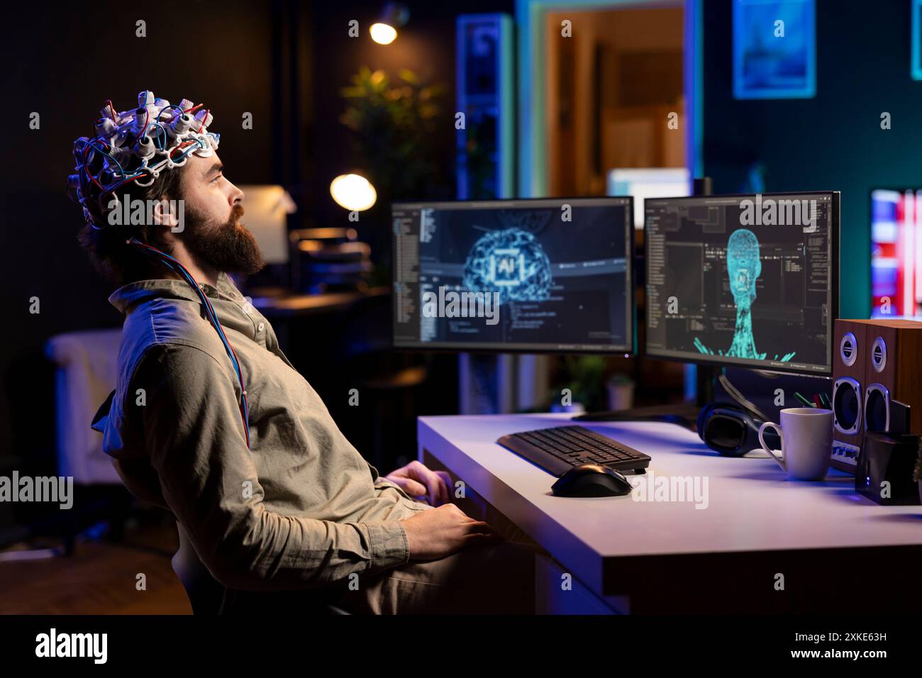 Computer engineer wearing EEG headset on head to communicate with artificial intelligence entity ...