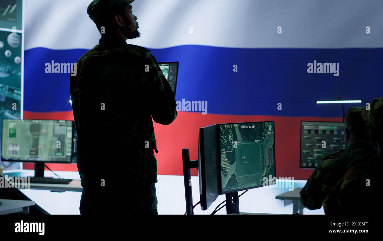 Russian military commander in high tech government control room ...