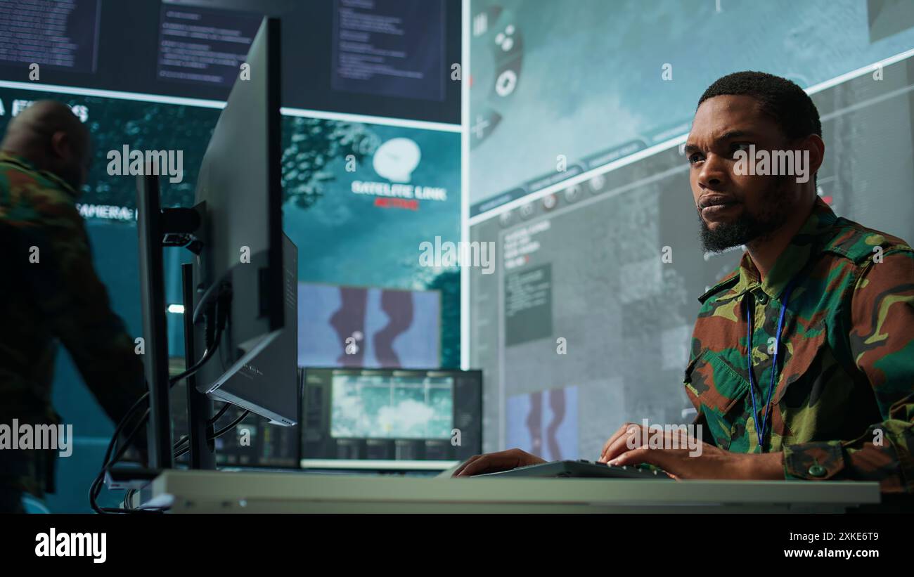 Military professionals in a mission control center employs modern ...