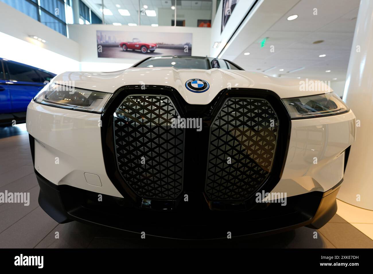 An unsold 2024 iX electric sports-utility vehicle sits on display at a ...