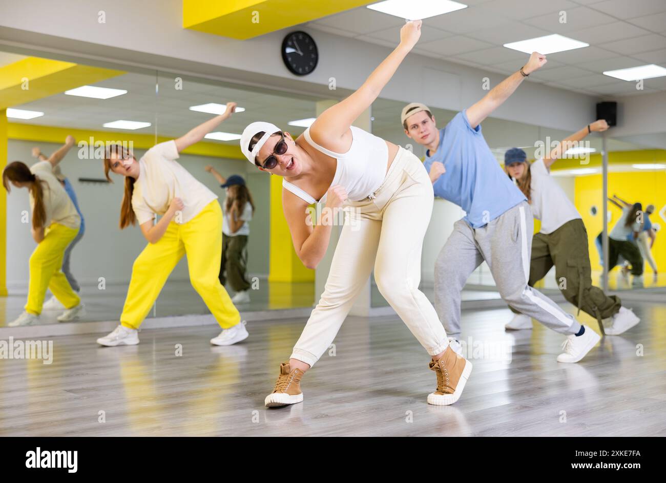 Teenagers learning breakdance dance in dance studio Stock Photo - Alamy