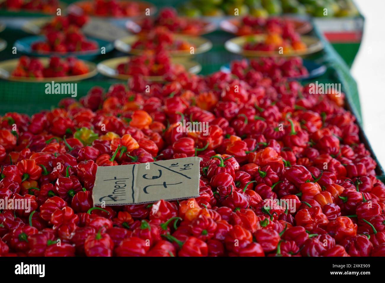 Red peppers on a traditional market, Cayenne, French Guiana Stock Photo ...