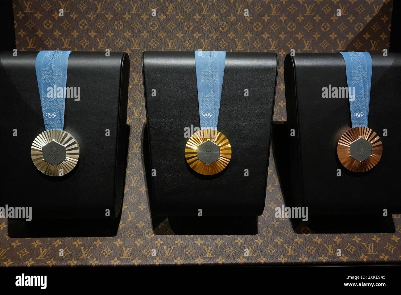A monogrammed trunk designed to protect and display the Olympic medals ...