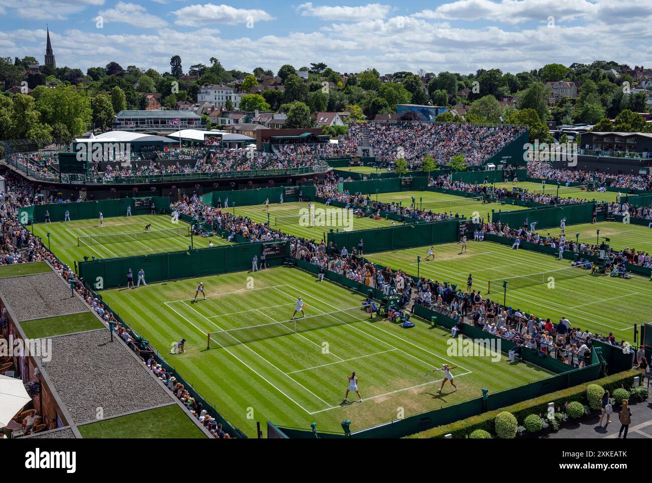 A general view overlooking the Southern outside courts with the spire ...