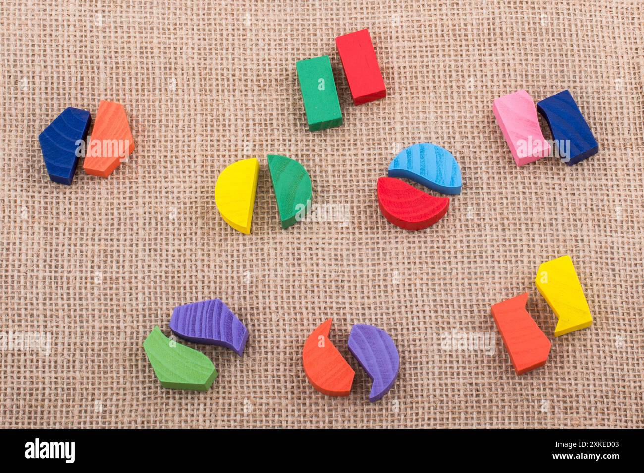 Colorful wooden pieces of a logic puzzle Stock Photo - Alamy