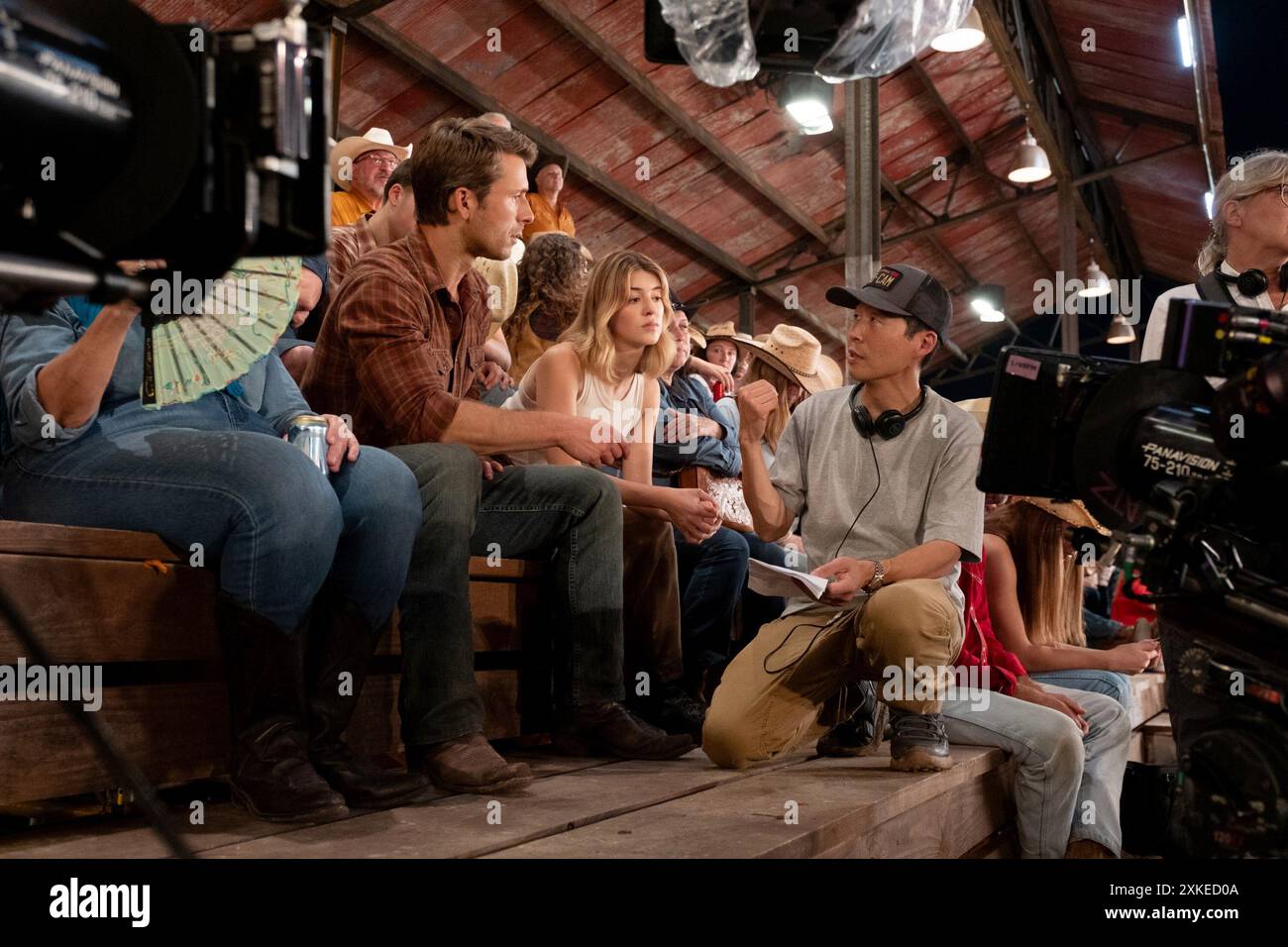 TWISTERS, from left: Glen Powell, Daisy Edgar-Jones, director Lee Isaac ...