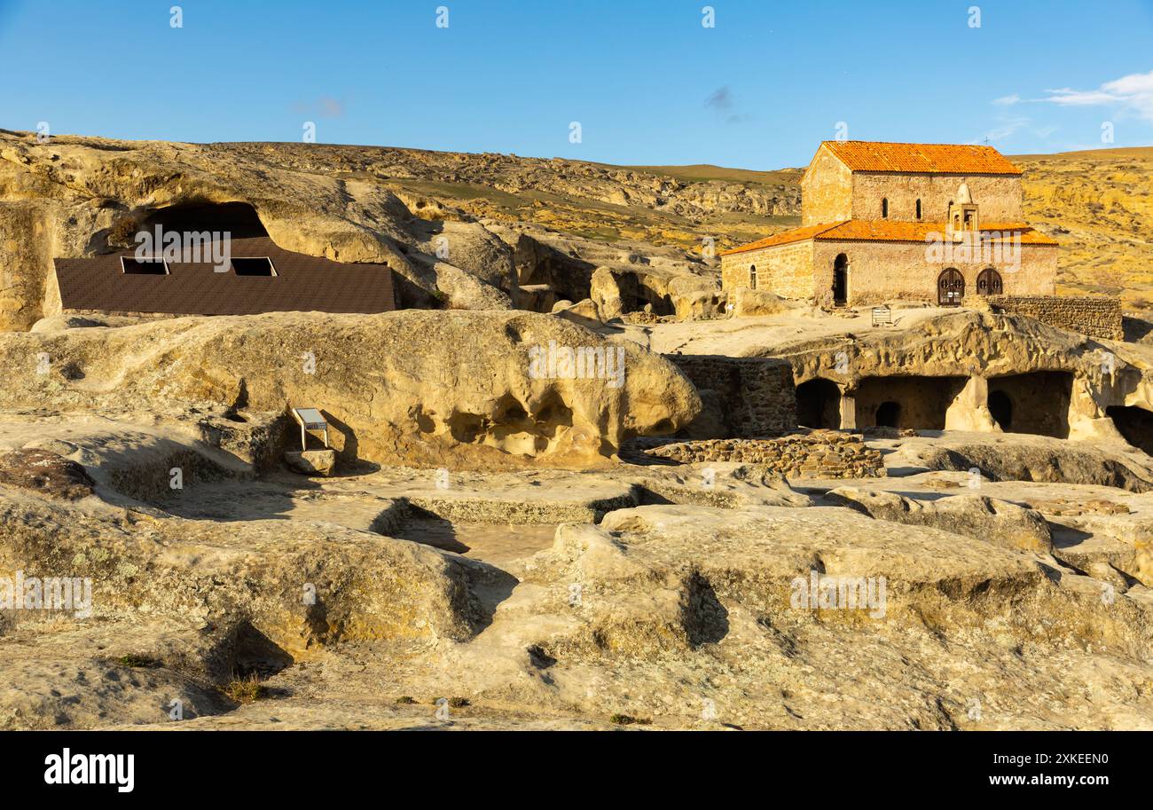 Ancient cave city of Uplistsikhe with active basilica, Georgia Stock ...