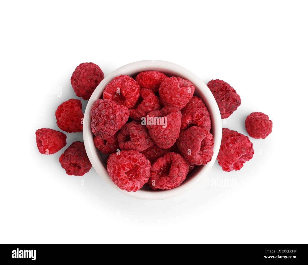 Bowl with tasty freeze-dried raspberry on white background Stock Photo ...