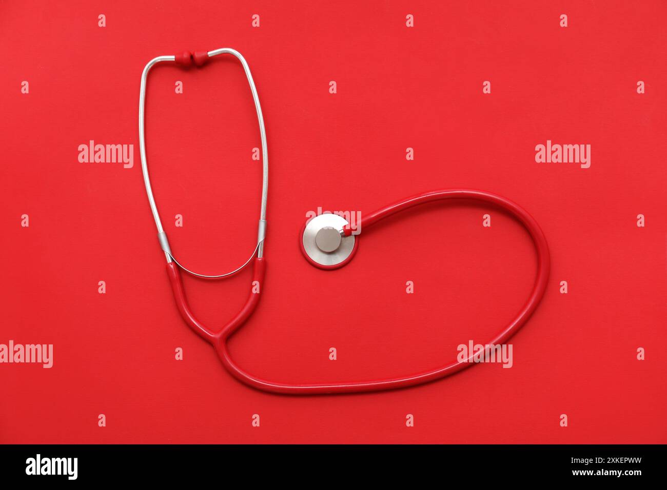 Modern stethoscope on red background Stock Photo - Alamy