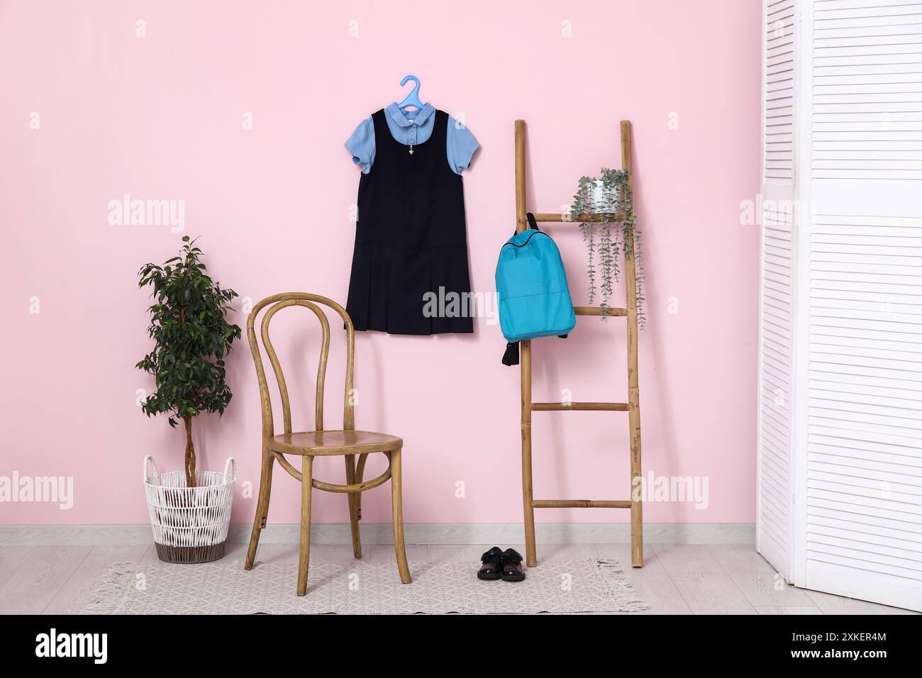 Stylish interior of modern room with school uniform Stock Photo - Alamy