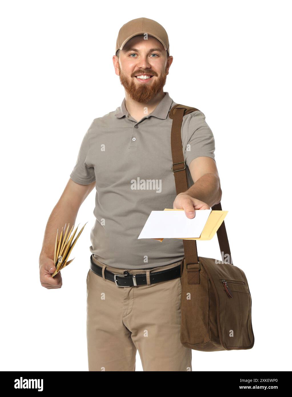 Happy young postman with brown bag delivering letters on white ...