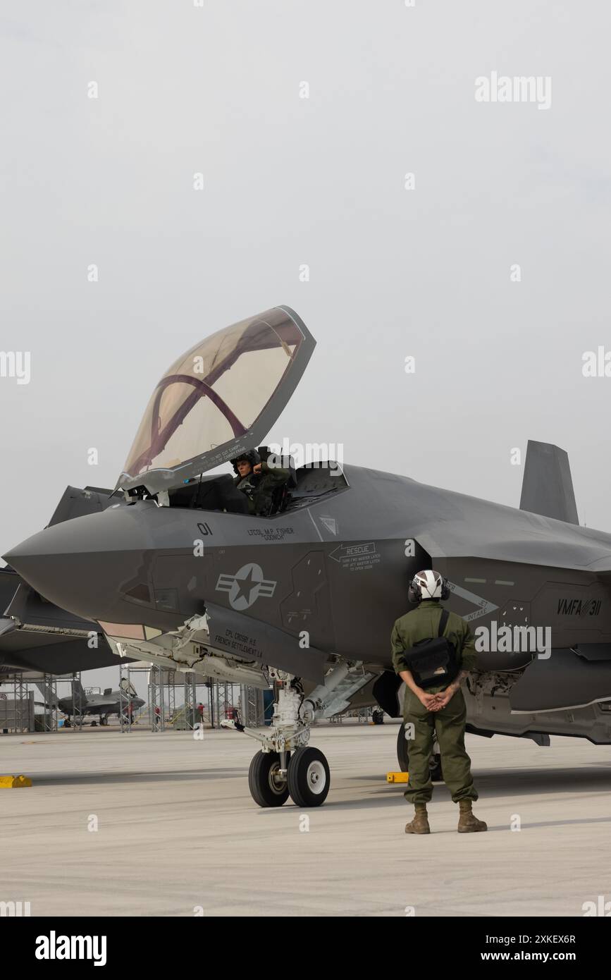 U.S. Marine Corps Maj. Timothy Potter, left, an F-35C Lightning II ...