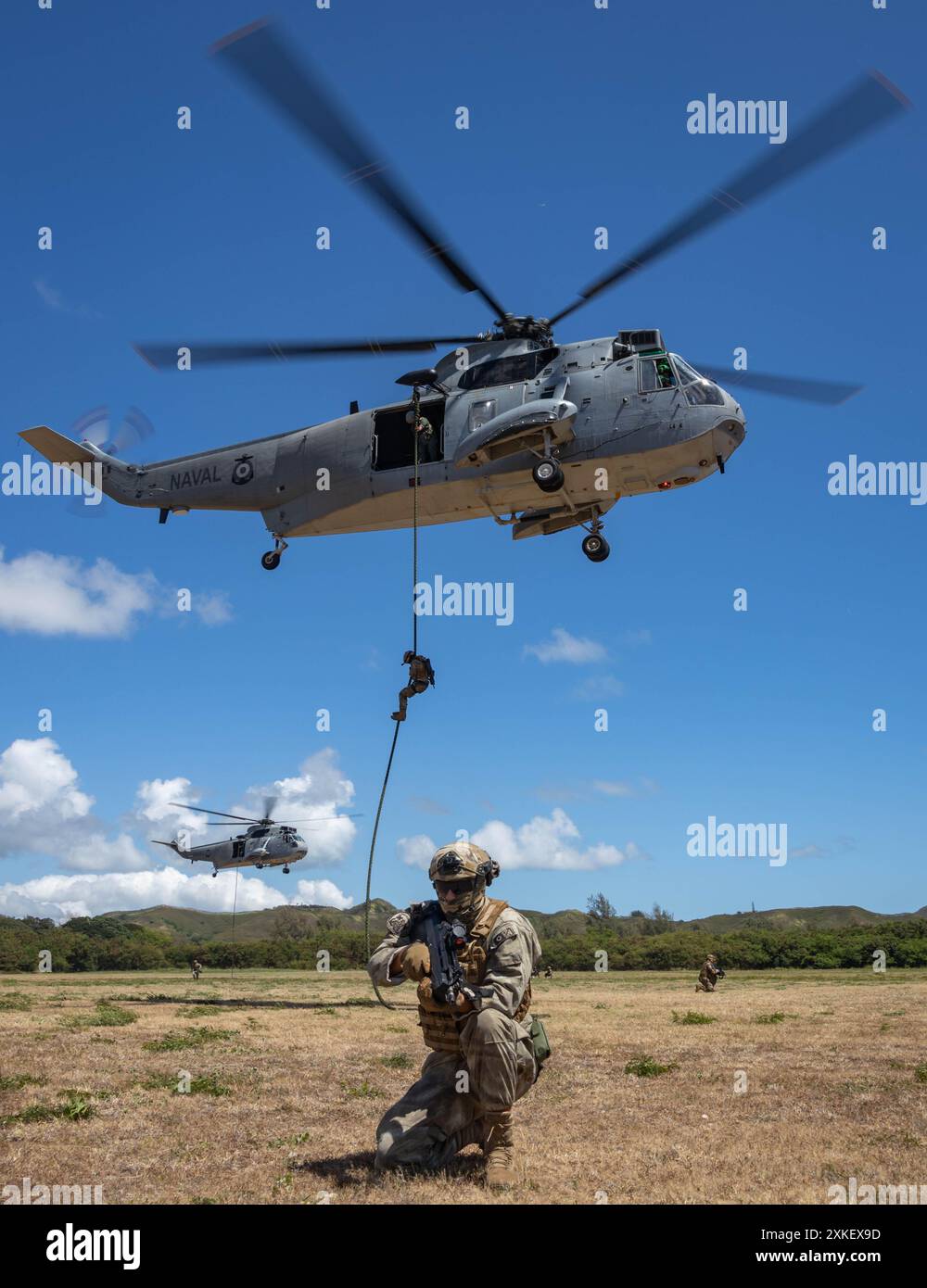 A Peruvian Naval Infantry Corps marine holds security after fast-roping ...