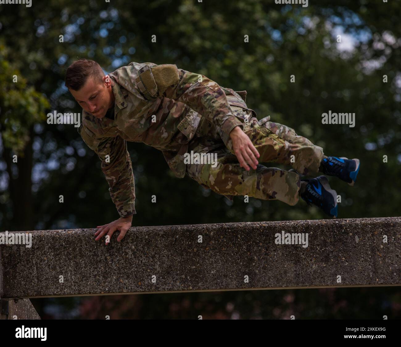 U.S. Army Reserve Staff Sergeant Conner J. Williams bounds over an ...