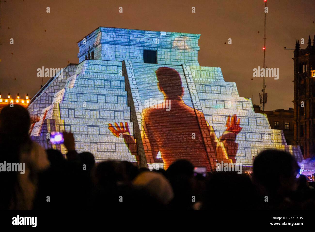 replica of the Kukulkan Pyramid of Chichén Itzá illuminated in a light ...