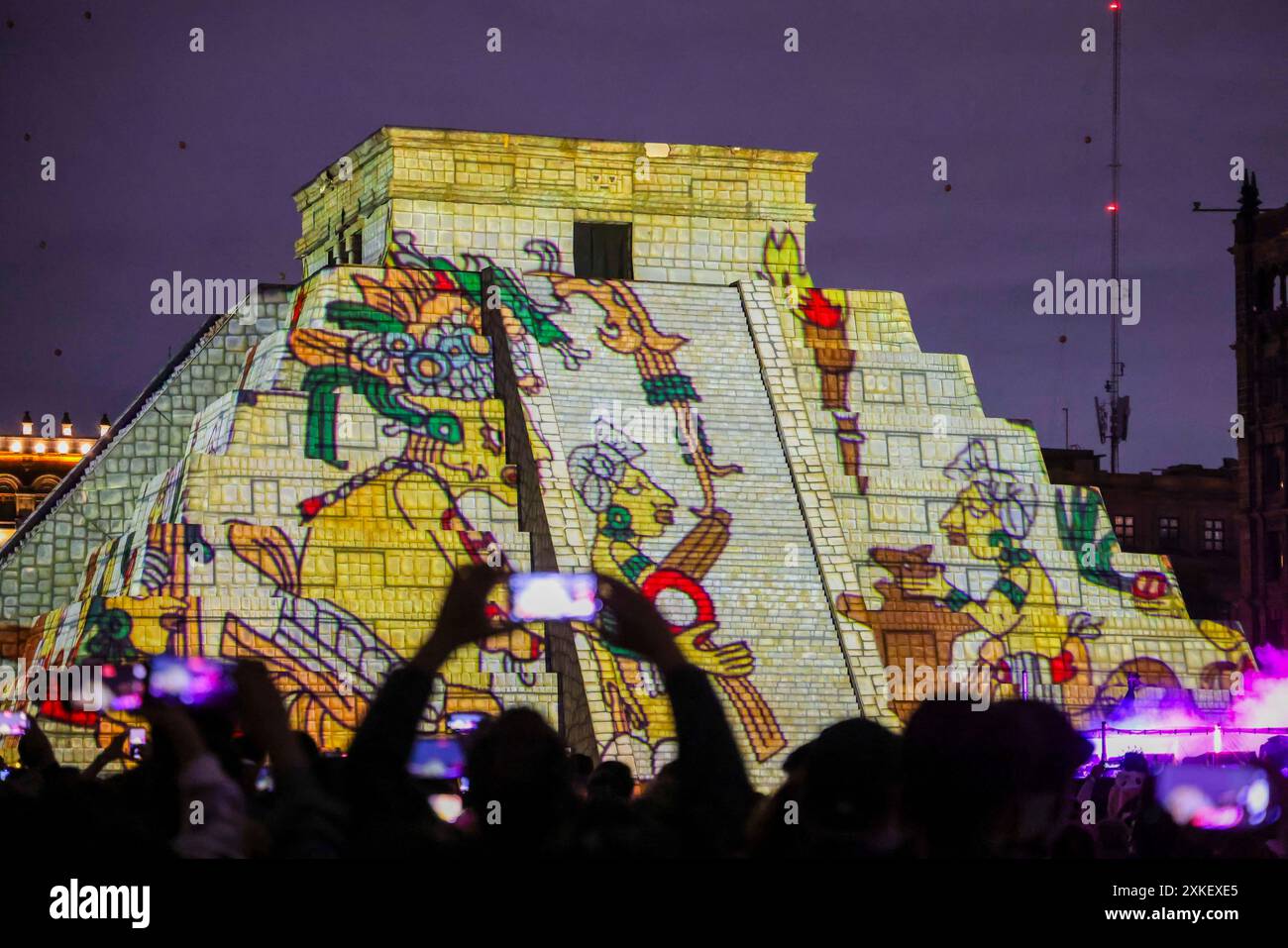 replica of the Kukulkan Pyramid of Chichén Itzá illuminated in a light ...