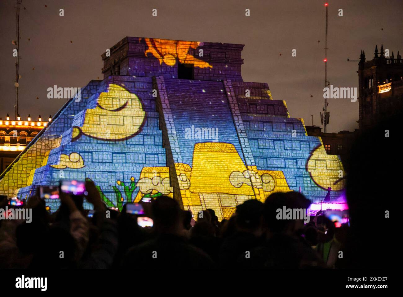 replica of the Kukulkan Pyramid of Chichén Itzá illuminated in a light ...