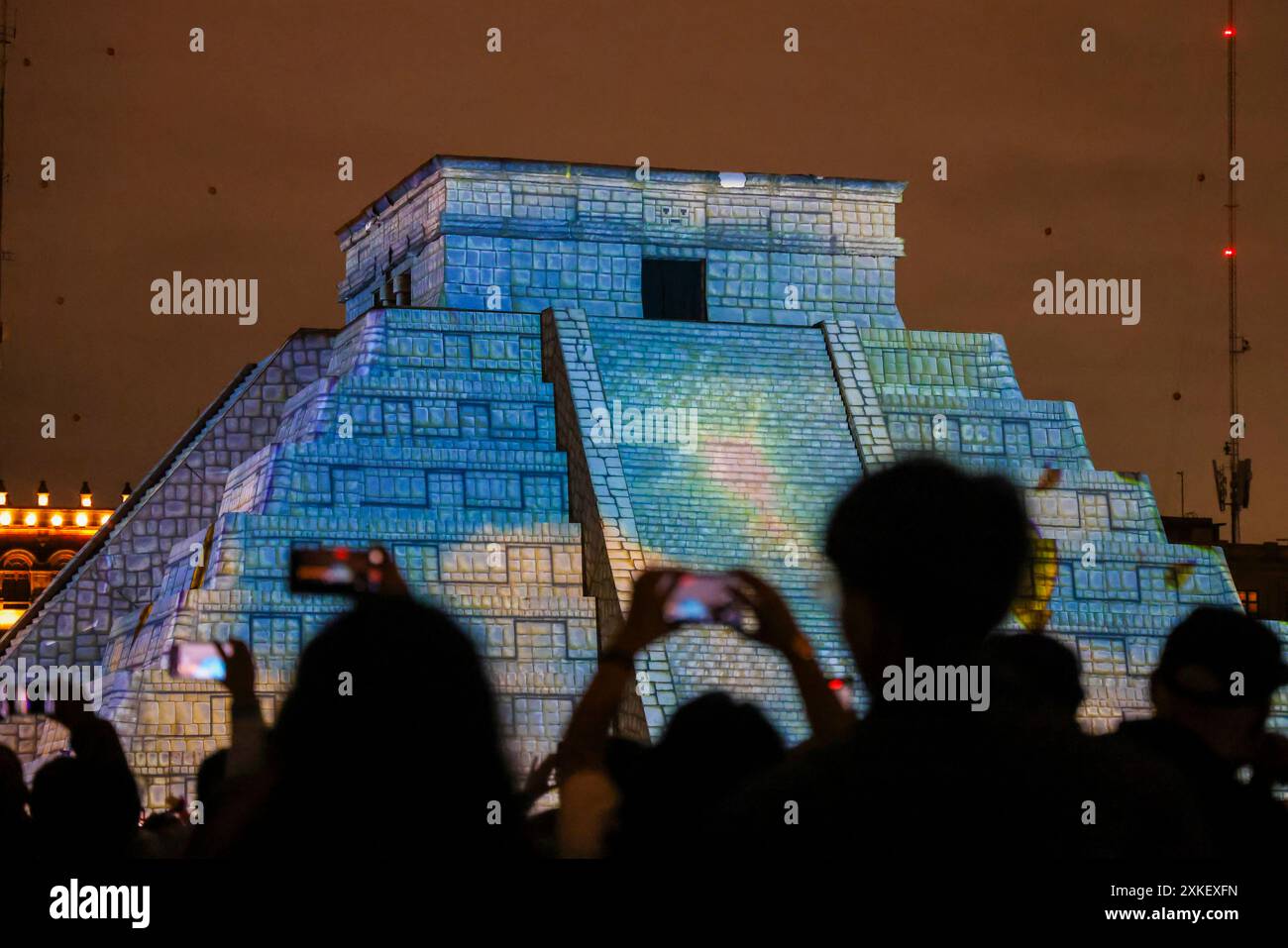 replica of the Kukulkan Pyramid of Chichén Itzá illuminated in a light ...