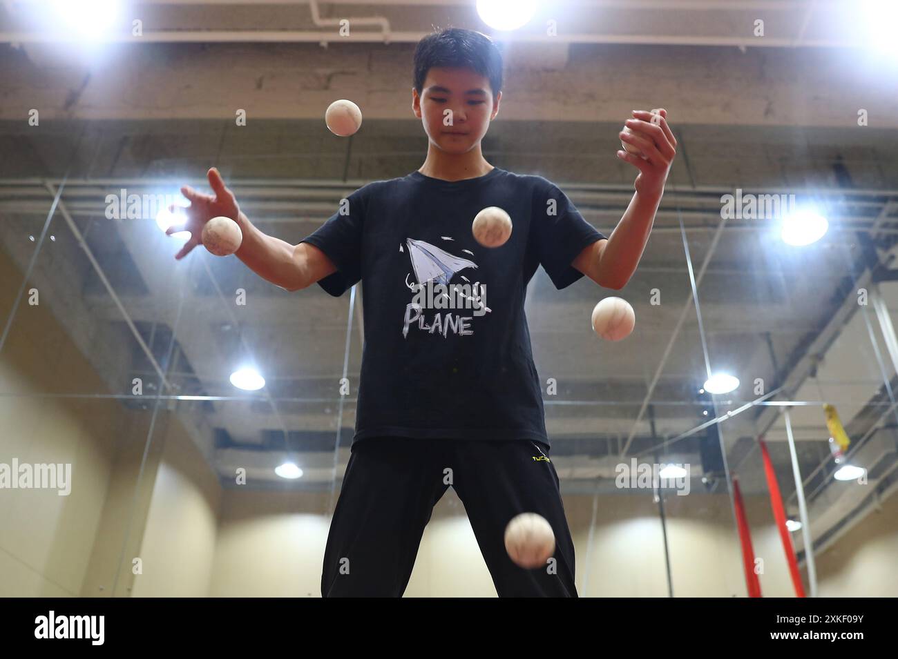 Jiangxi, China. 22, July, 2024. Young people are practicing acrobatics ...
