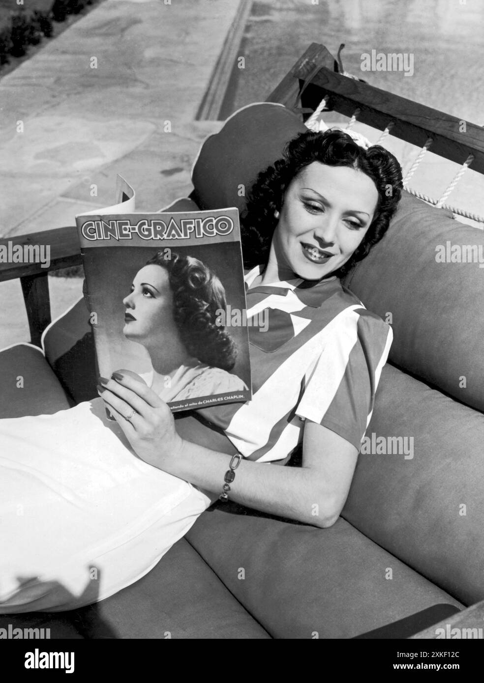 Cuba, c 1939 A woman reading the Cuban film magazine, Cine-Grafico ...