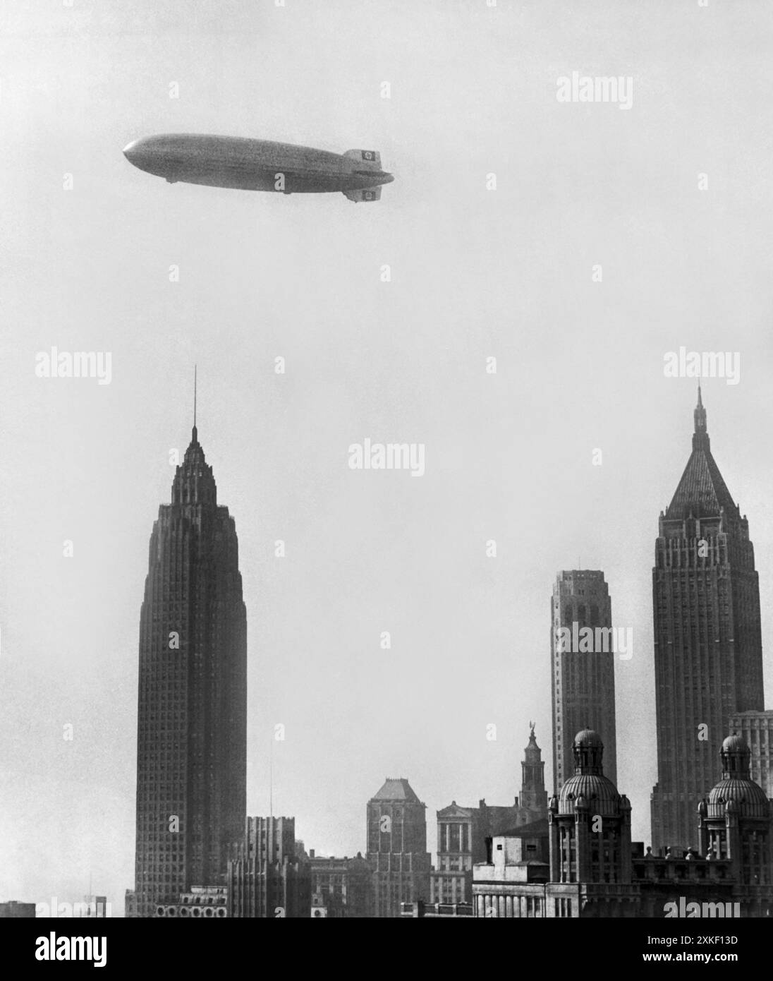 New York, New York May 6, 1937 The Hindenburg dirigible flying over New ...