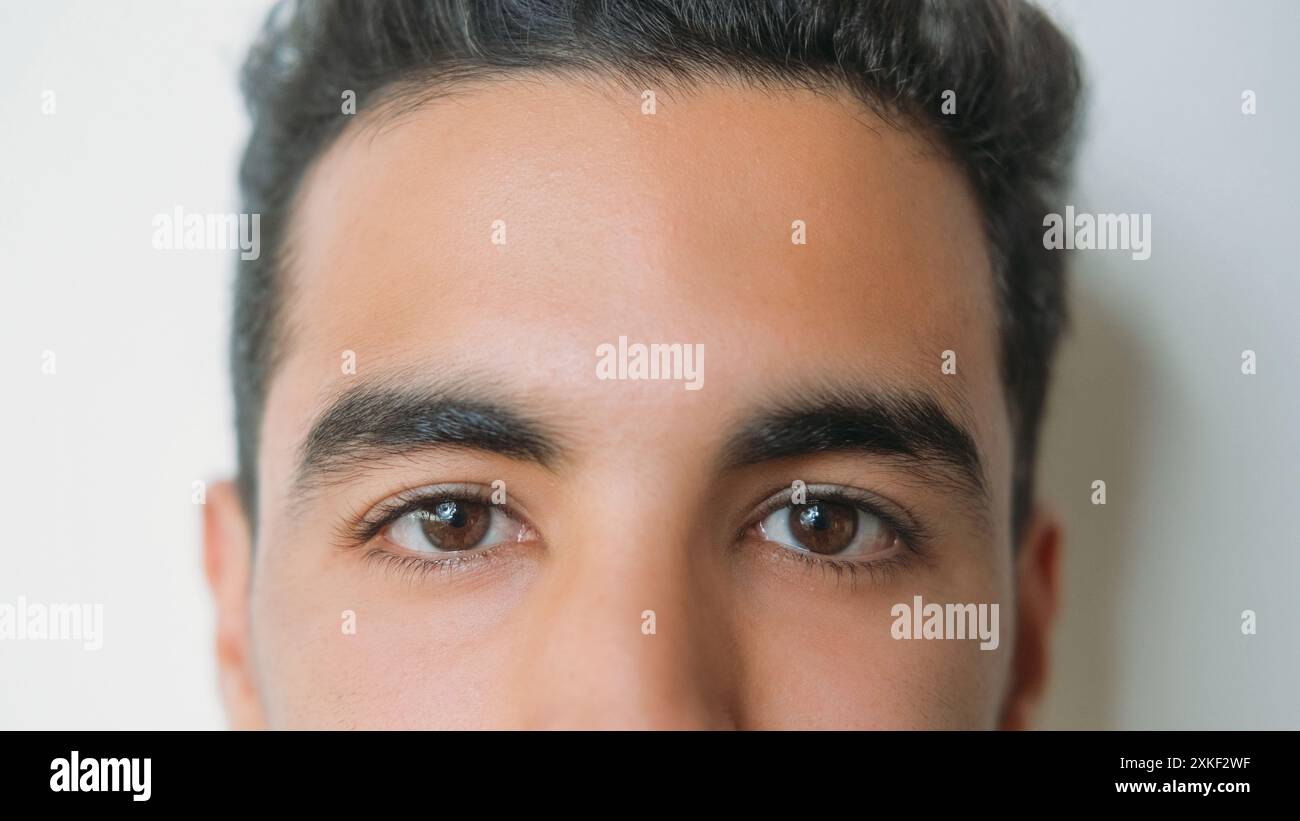 Male cosmetology. Facial treatment. Handsome man half face portrait ...