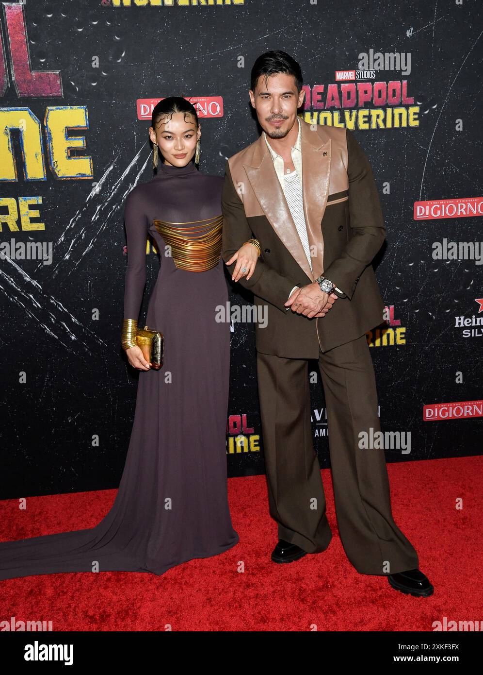 Lucy Qiu, left, and Lewis Tan attend the world premiere of Marvel ...