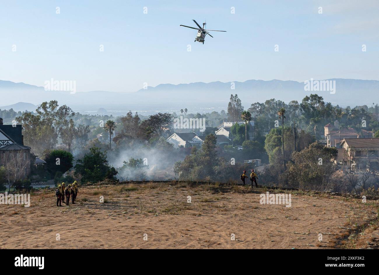 Riverside, United States. 21st July, 2024. A Cal Fire helicopter makes ...