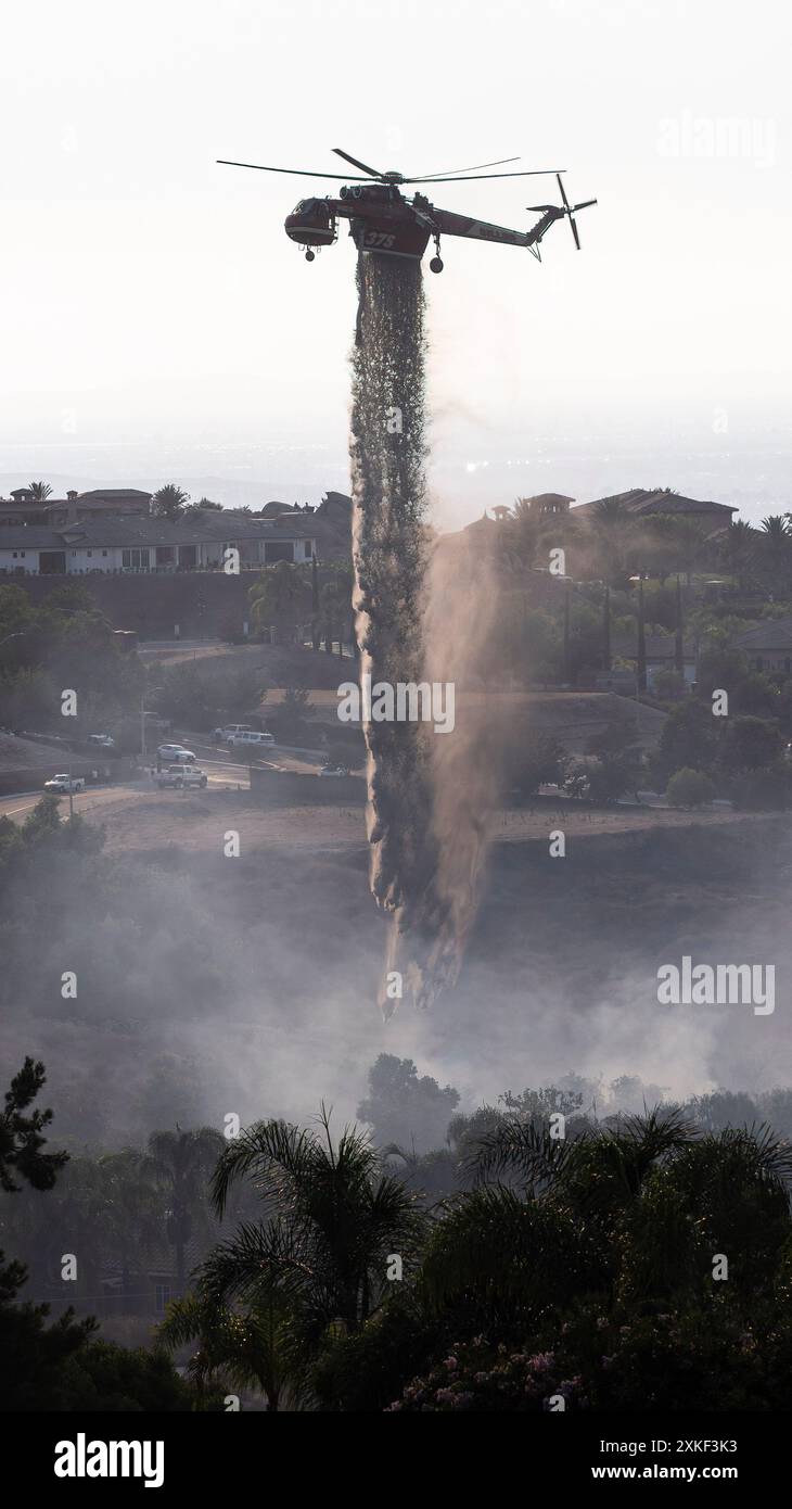 Riverside, United States. 21st July, 2024. A Cal Fire helicopter makes ...