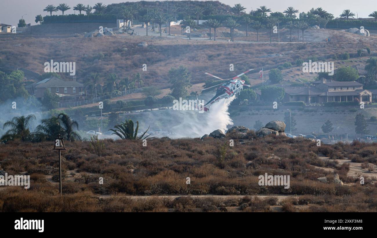 Riverside, United States. 21st July, 2024. A Cal Fire helicopter makes ...