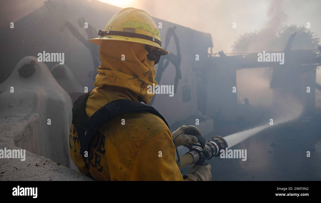 Riverside, United States. 21st July, 2024. A Cal Fire Firefighter ...