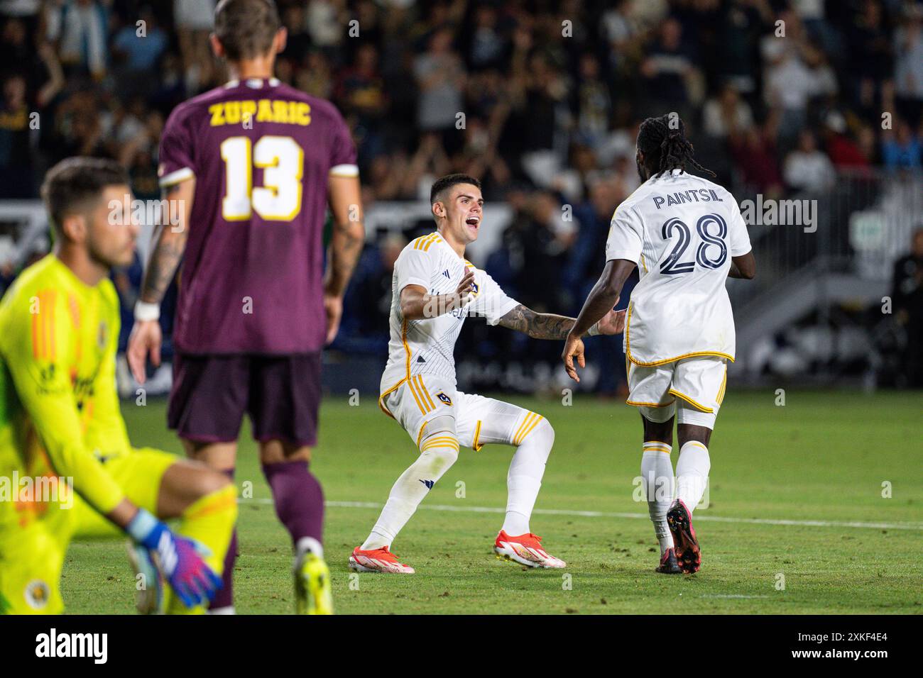 Los Angeles Galaxy forward Gabriel Pec (11) celebrates with forward ...