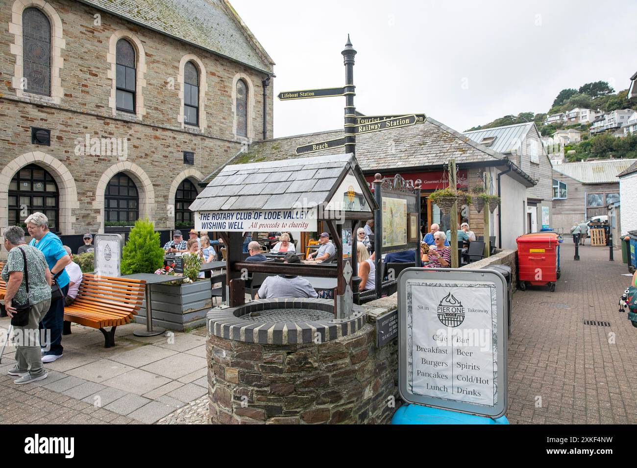 Looe Cornwall, Looe town centre with prominent rotary club wishing well ...