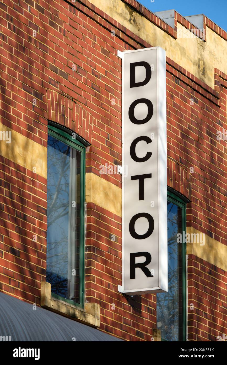 A vertical sign indicating a doctor/medical centre/doctor's surgery ...