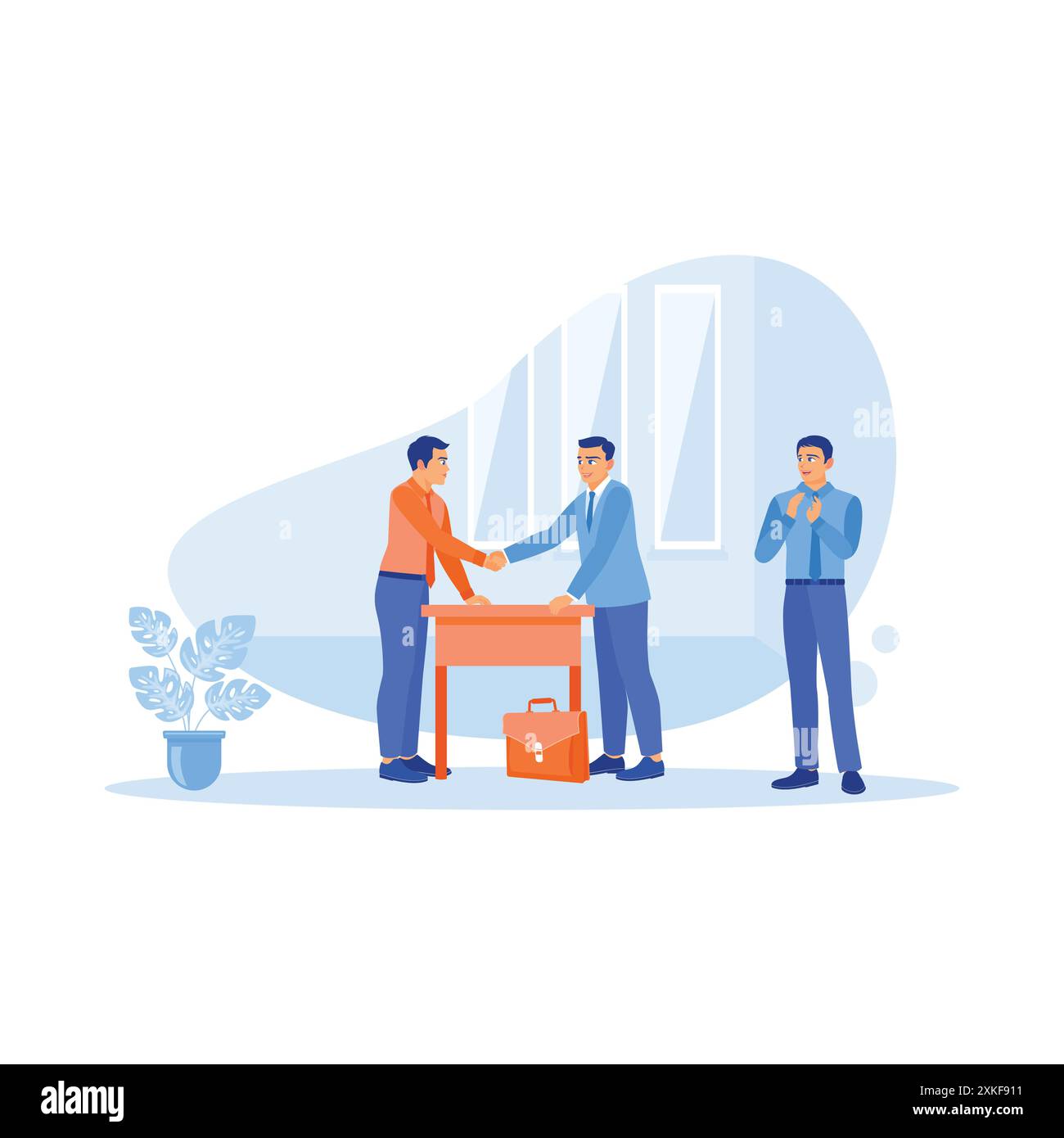 Happy business partners shaking hands on the table. Make a mutual ...