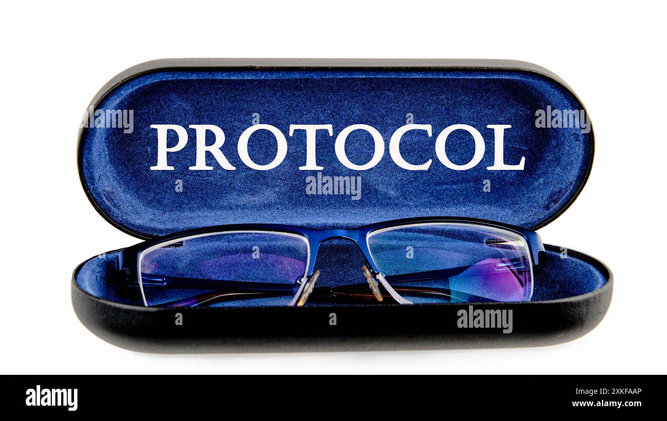 A word PROTOCOL written symbol on the inside of the glasses case on a ...