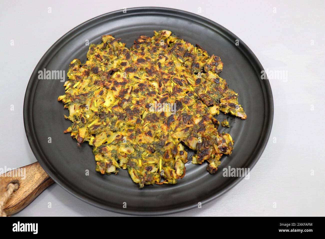 Methi chi Vadi or Methi Thalipeeth. It is a healthy snack made with ...