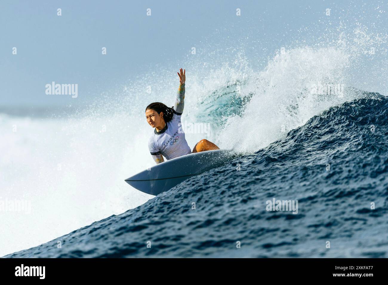 Shino Matsuda, of Japan, surfs a wave on a training day before the 2024 ...