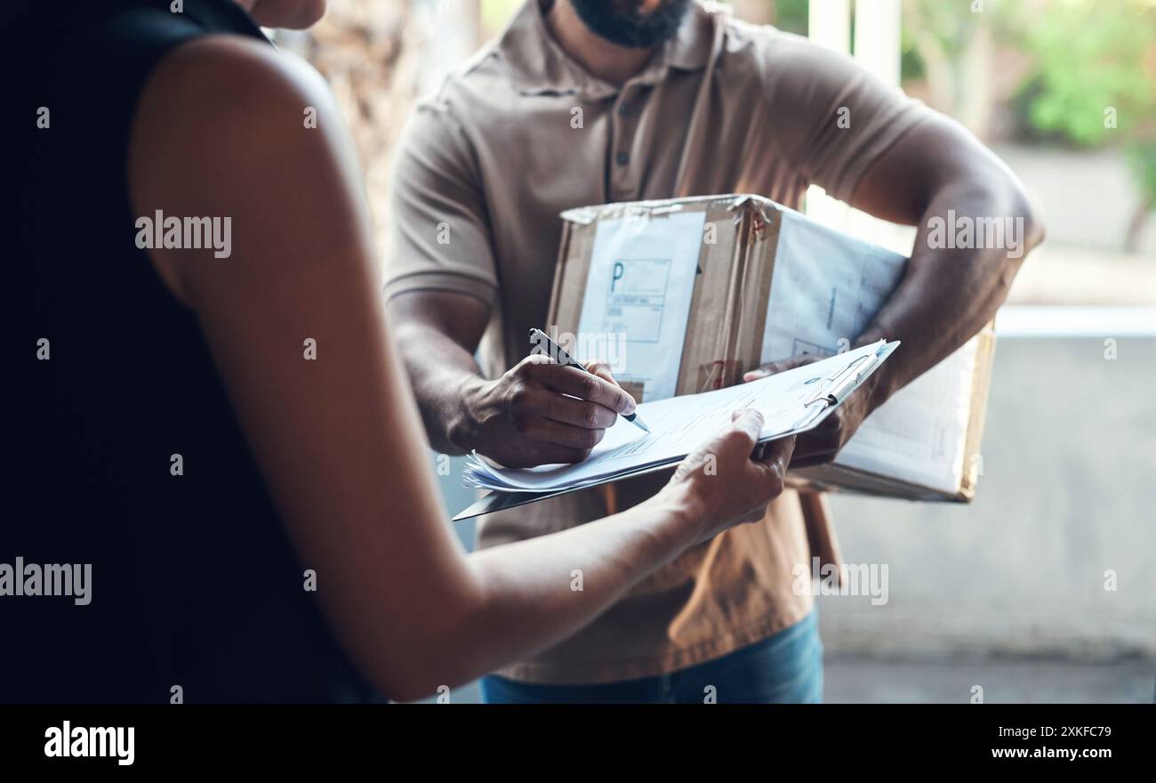 Delivery man, hands and box in home with signature for online shopping ...